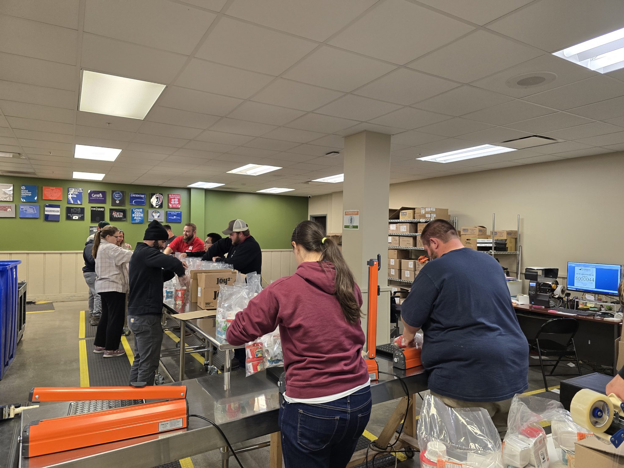 Omaha Post Student Chapters Volunteer at Food Bank - SAME